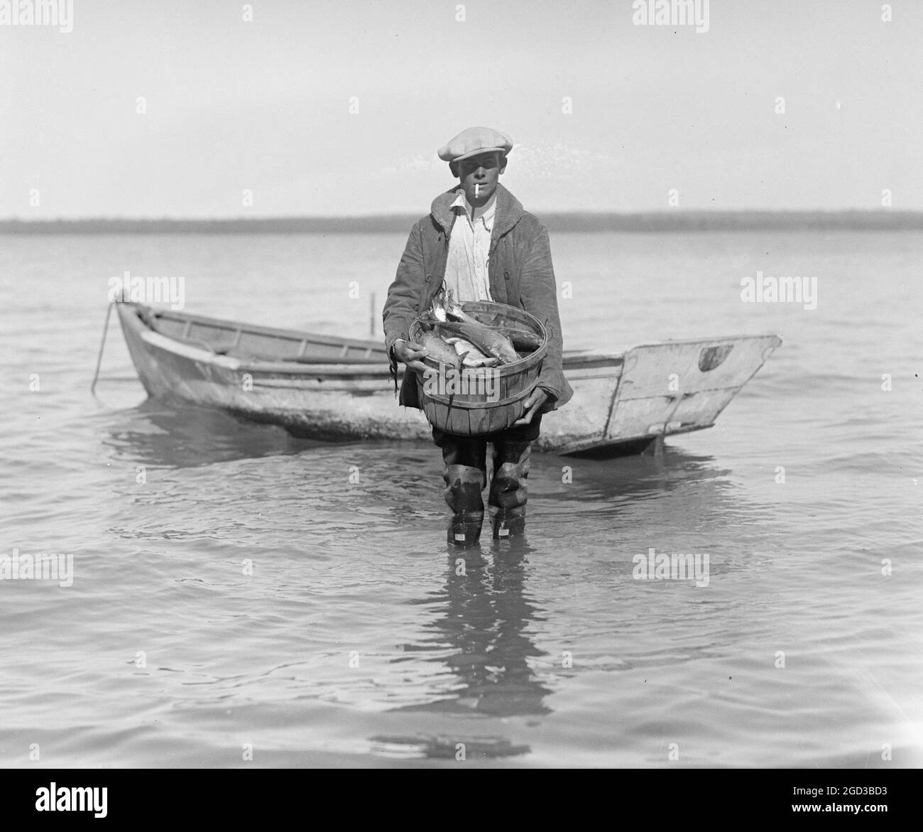 Early 1900s fishing Black and White Stock Photos & Images - Alamy