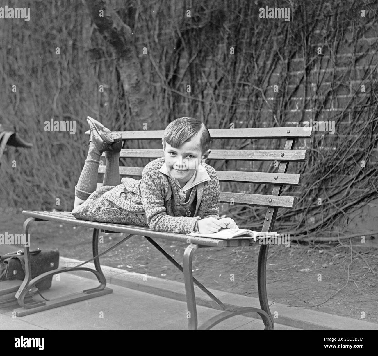 Lying on the bench Black and White Stock Photos & Images - Alamy