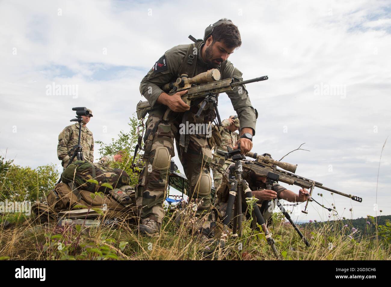 French soldiers adjust tripod during the 2021 European Best Sniper Team ...