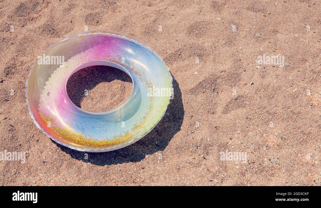 Swimming Ring. Children Baby Swimming Lap. Inflatable swim ring on sand ...