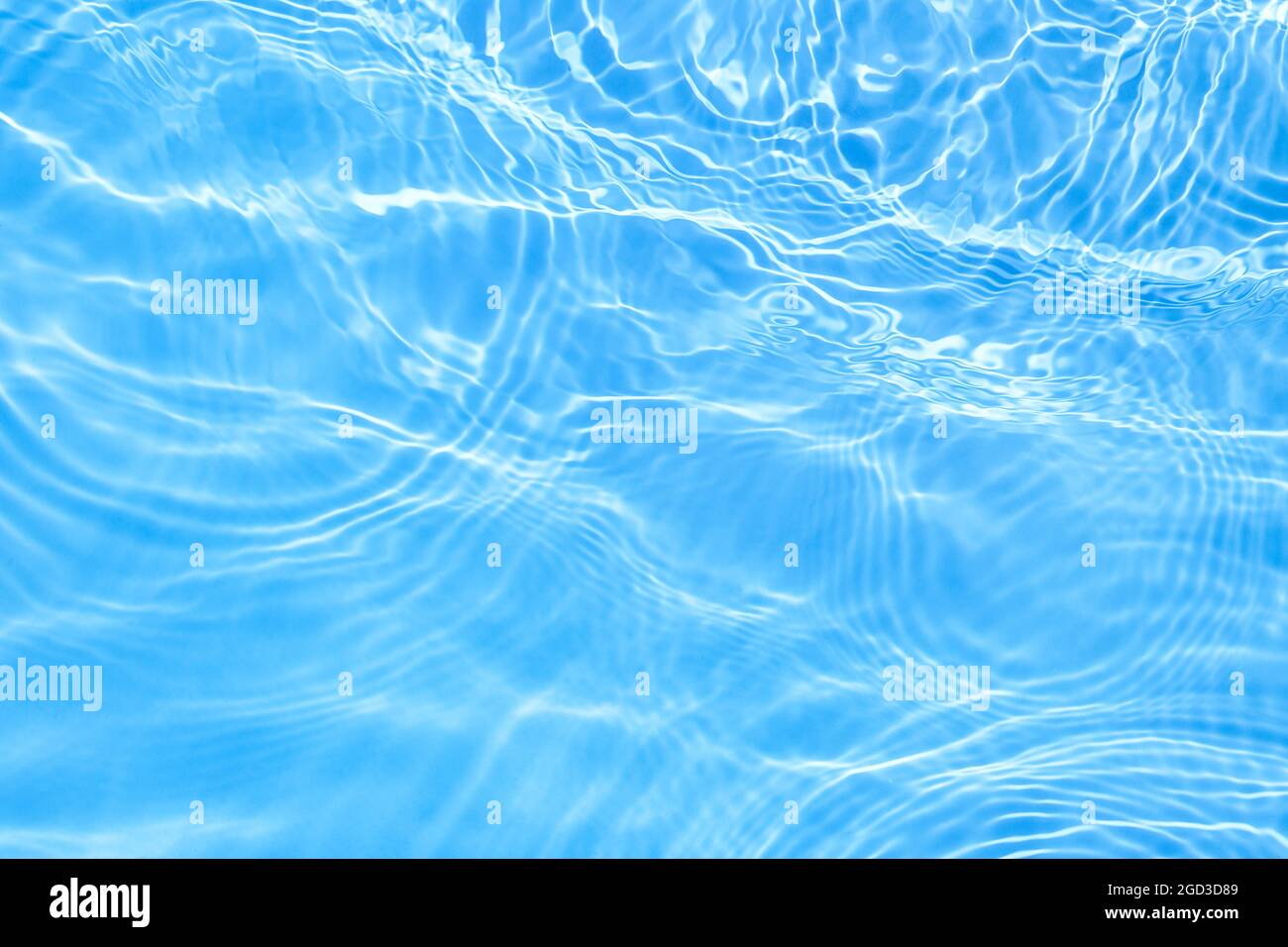 Surface of blue swimming pool water with light reflection. Texture of ...