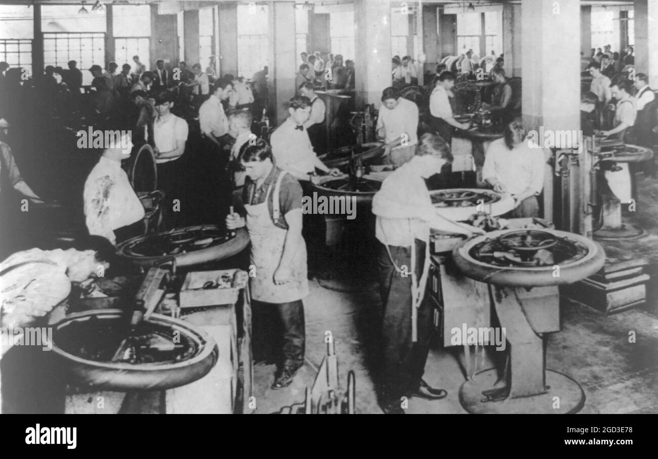 Building Goodrich tires, adding side strip and tread ca. 1909 Stock ...
