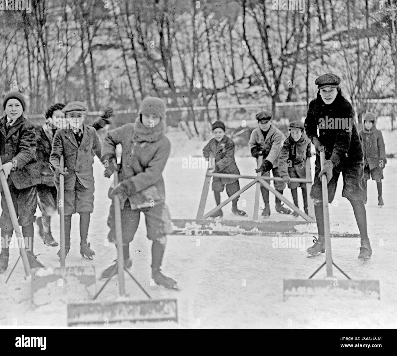 Early 1900s boys on frozen lake hi-res stock photography and images - Alamy