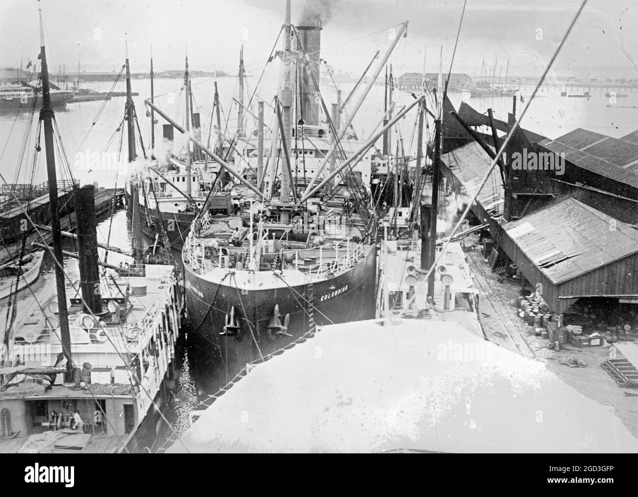 Steamer loading sugar alongside dock in Honolulu, [Hawaiian Islands ...