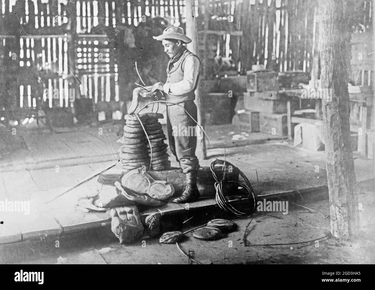 Early 1900s rubber worker hi-res stock photography and images - Alamy