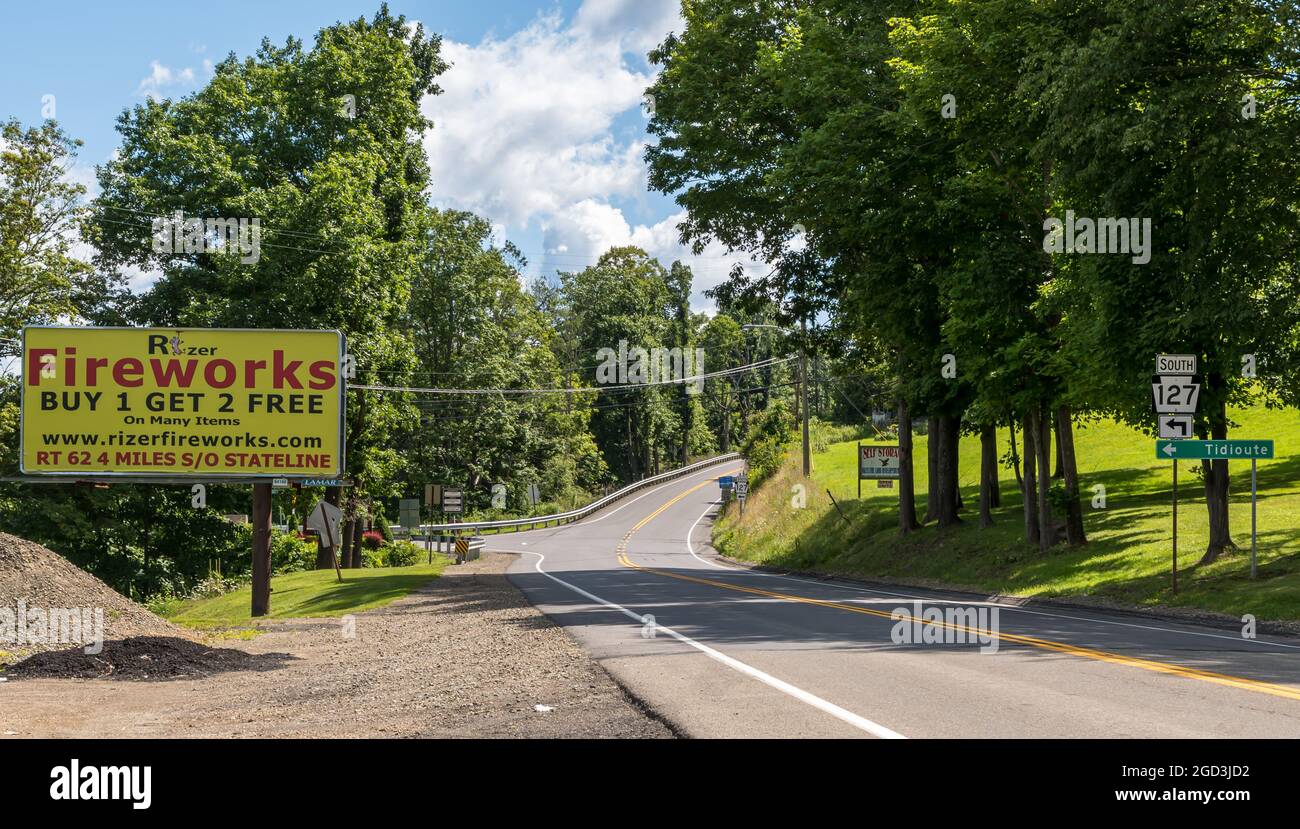 Road signs and a billboard along State Route 62 north near the ...