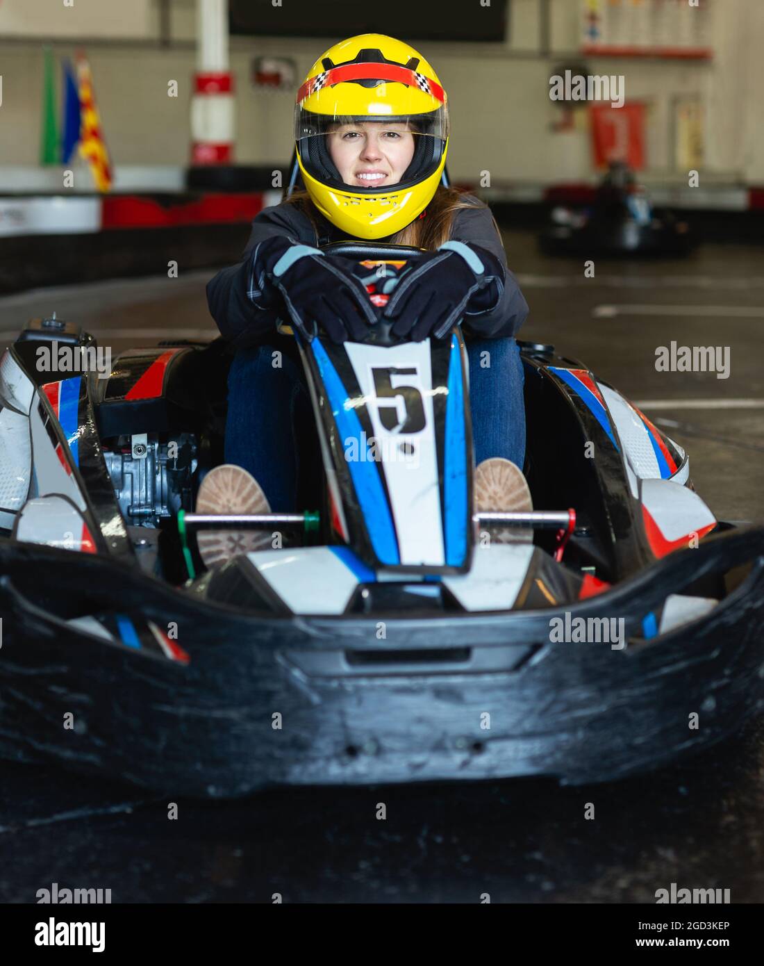 female go-cart racer posing at cart circuit Stock Photo - Alamy