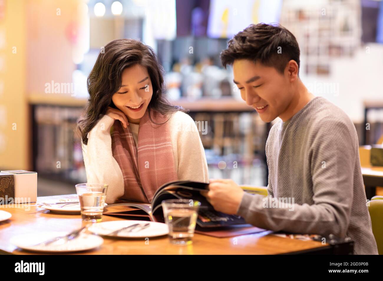Couple ordering dinner hi-res stock photography and images - Alamy