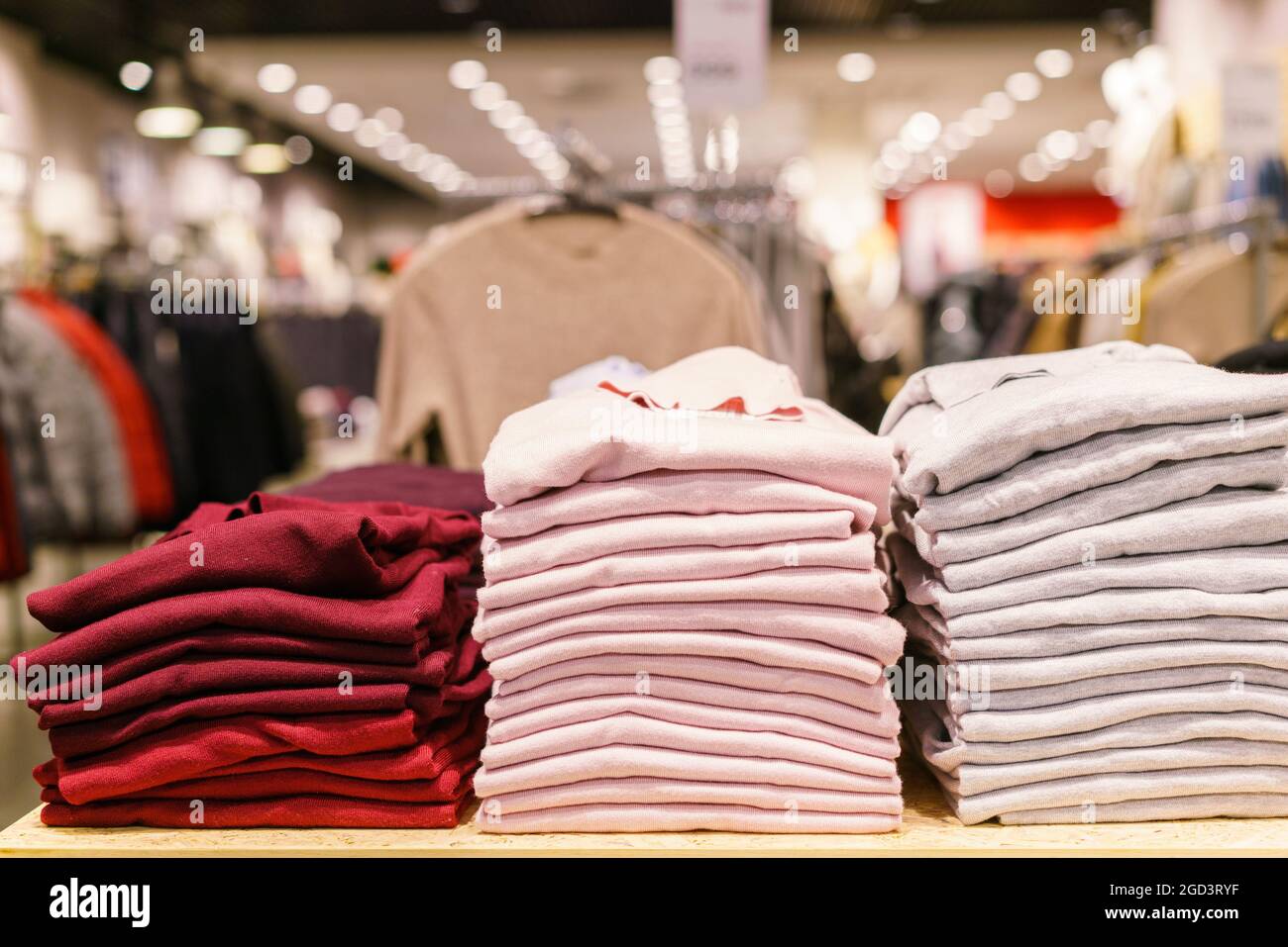 Stack of colorful t-shirts. Layers of multi-colored fabric. Stack of ...