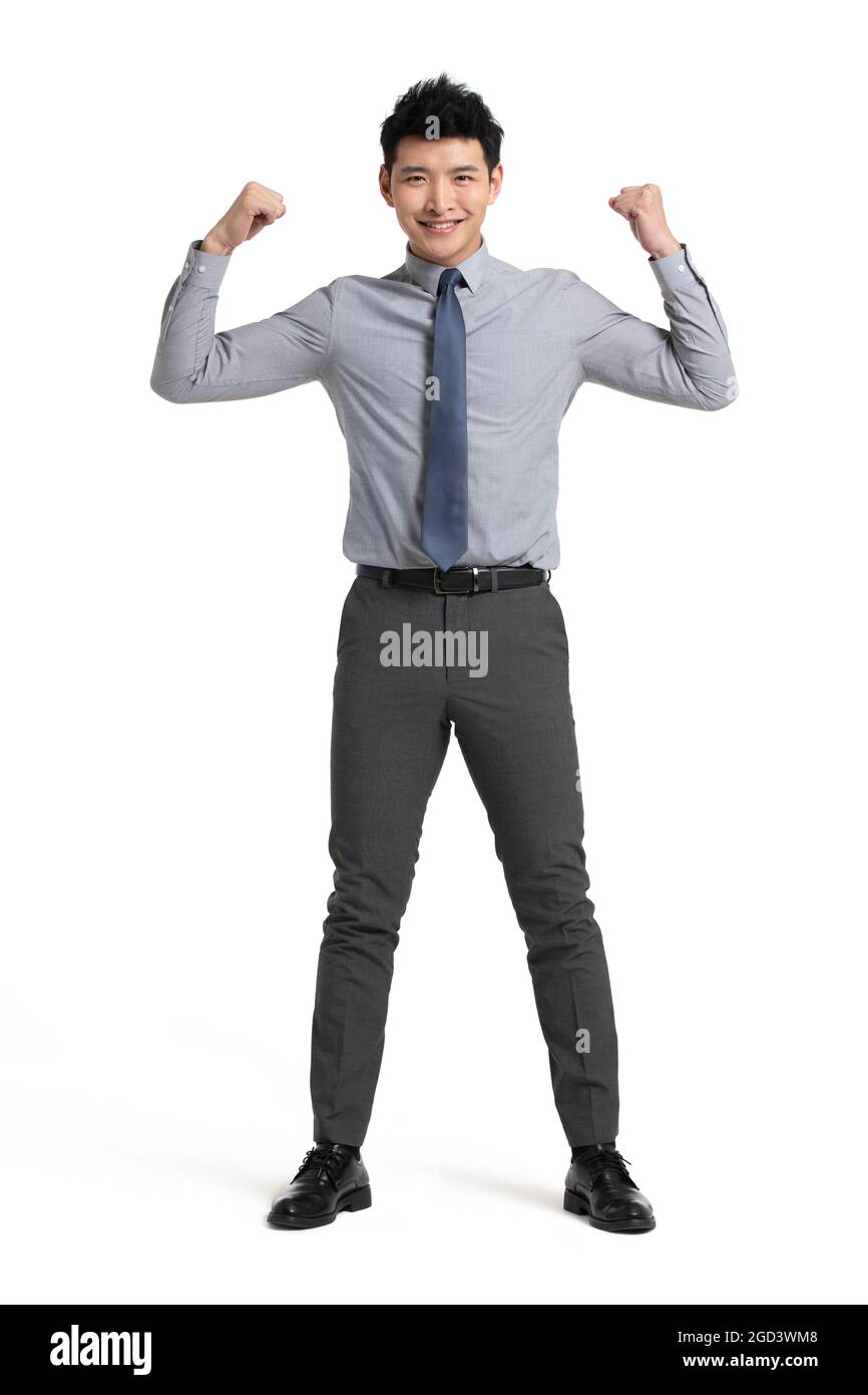 Happy young businessman Stock Photo - Alamy
