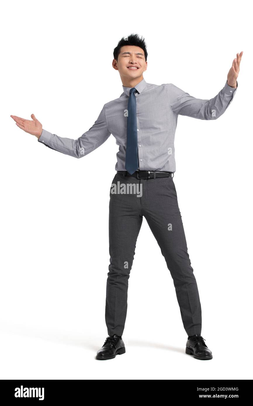 Happy young businessman Stock Photo - Alamy