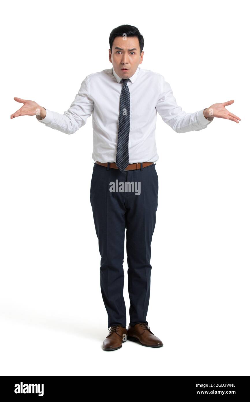 Businessman shrugging hi-res stock photography and images - Alamy