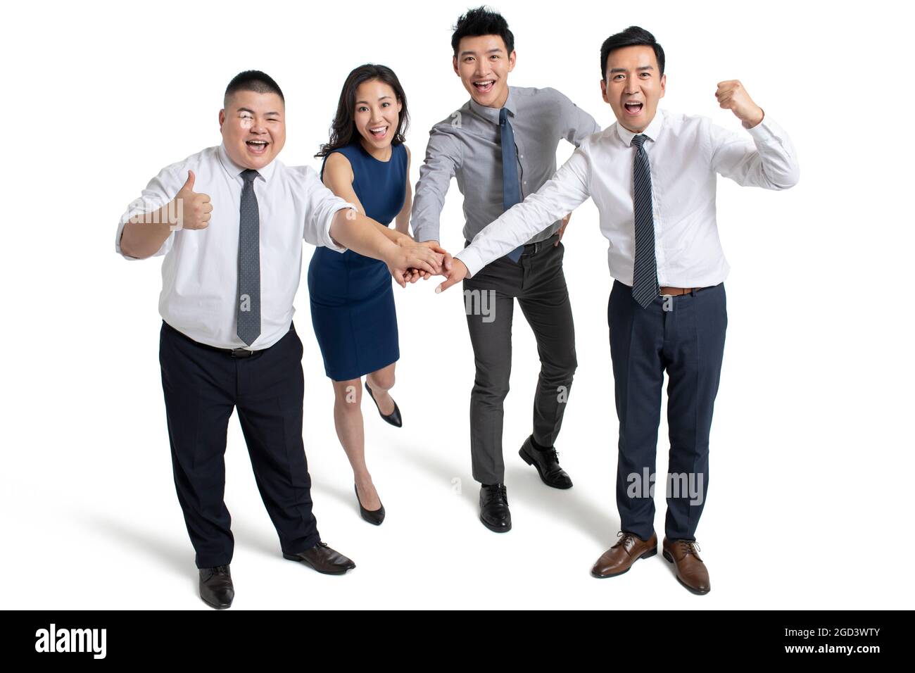 Business people stacking hands together Stock Photo - Alamy