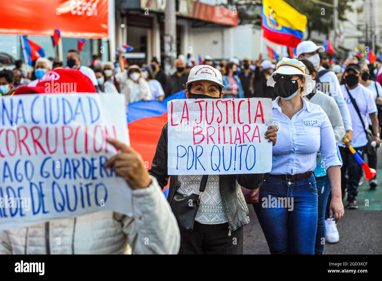 Quito, Ecuador. 11th Aug, 2021. Protesters hold placards during the ...