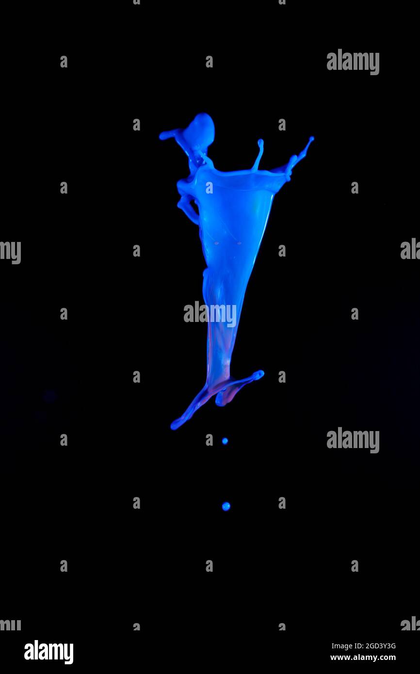 A blue splash on black background to layer, composite and blend with ...