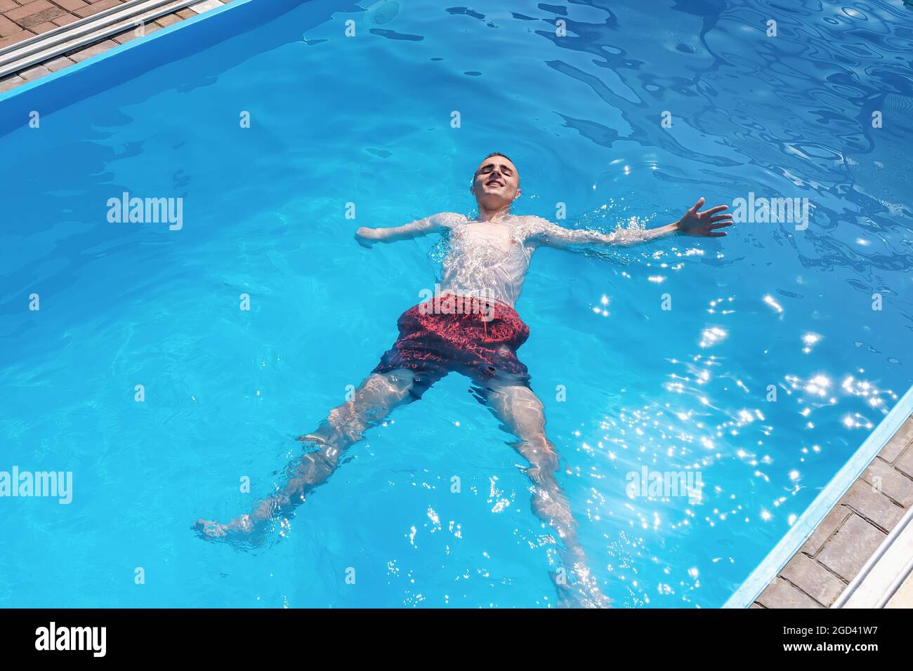 Disabled man chilling in swimming pool Stock Photo - Alamy Disabled man chilling in swimming pool Stock Photo - Alamy
