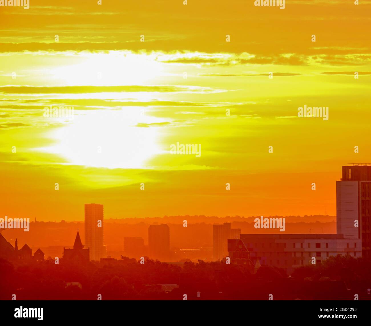 Beautiful, bright orange sunrise over London as viewed from Parliament ...