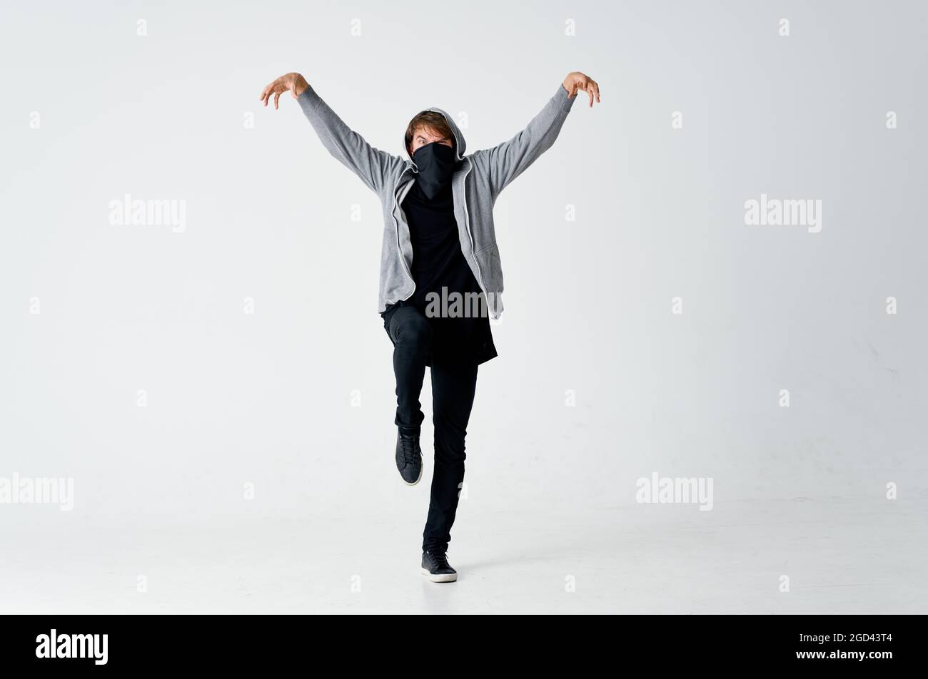 man thief hides his face crime hacker gangster Stock Photo - Alamy