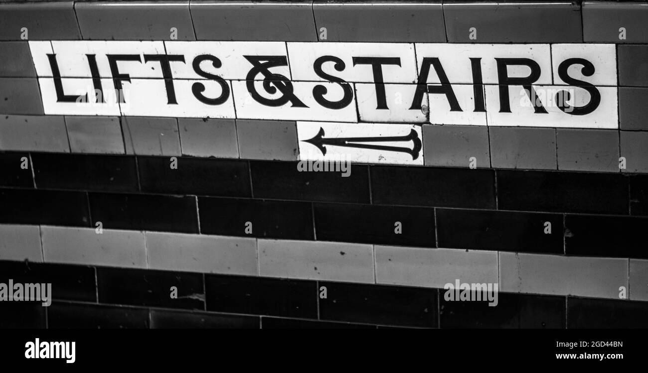 Sign showing the location of lifts and stairs Stock Photo - Alamy
