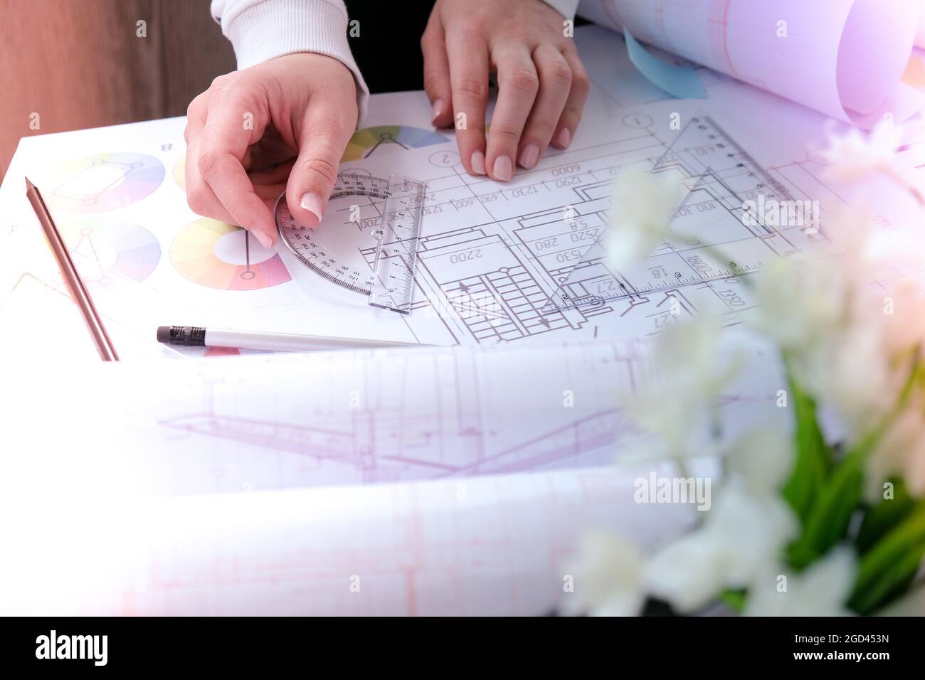 Hands use pencil with a protractor. Architectural Project drawings with ...
