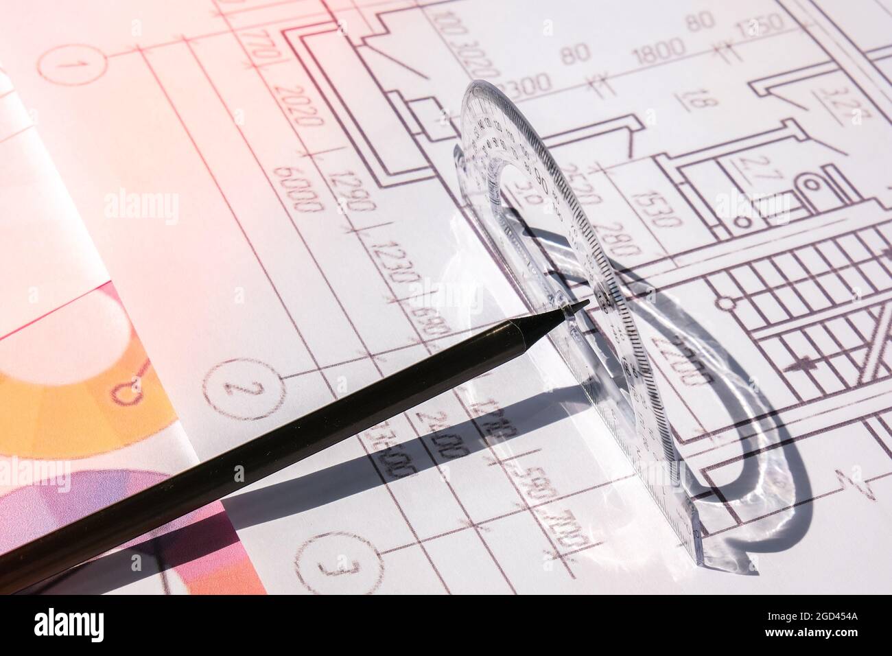 A pencil with a protractor. Architectural Project drawings with tools ...