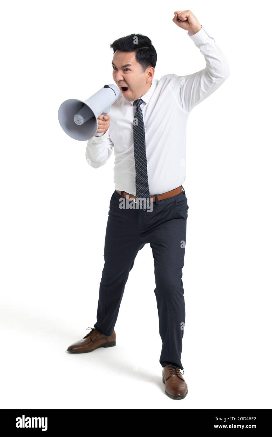 Mature businessman shouting through bullhorn Stock Photo - Alamy