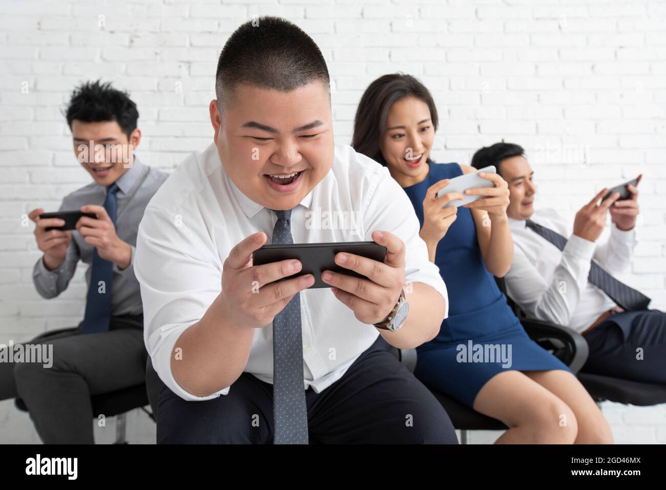Business people using smartphone Stock Photo - Alamy