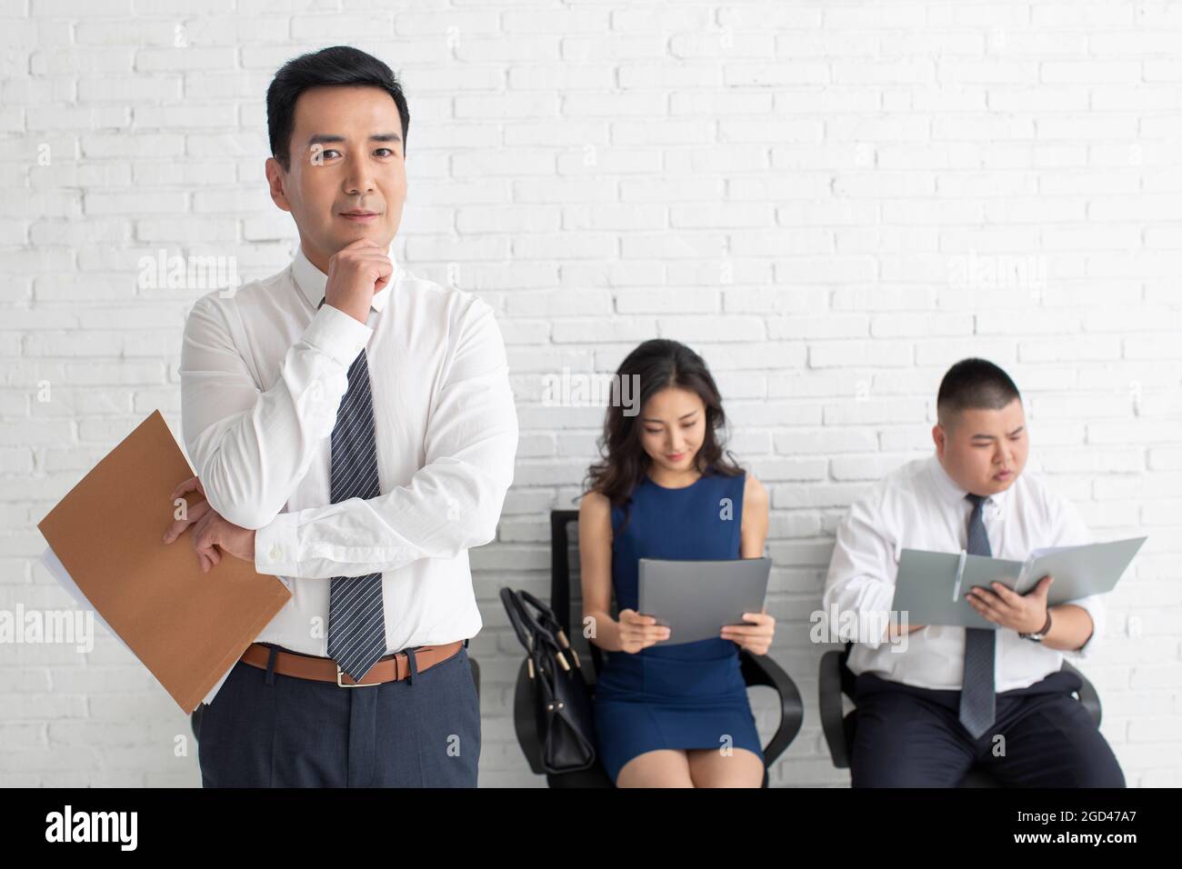 Business people waiting for job interview Stock Photo - Alamy