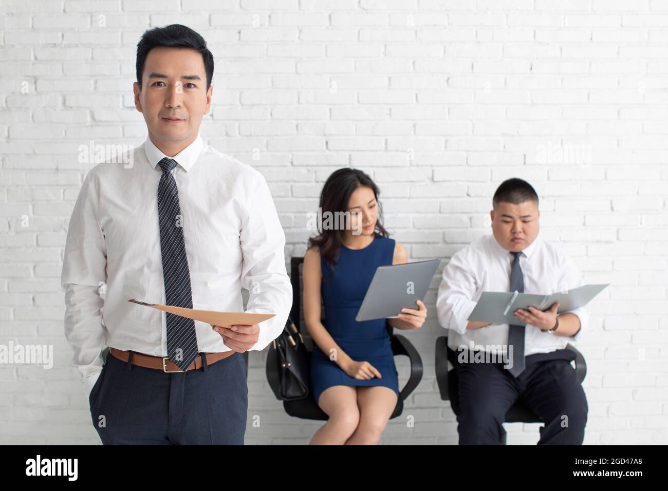 Business people waiting for job interview Stock Photo - Alamy