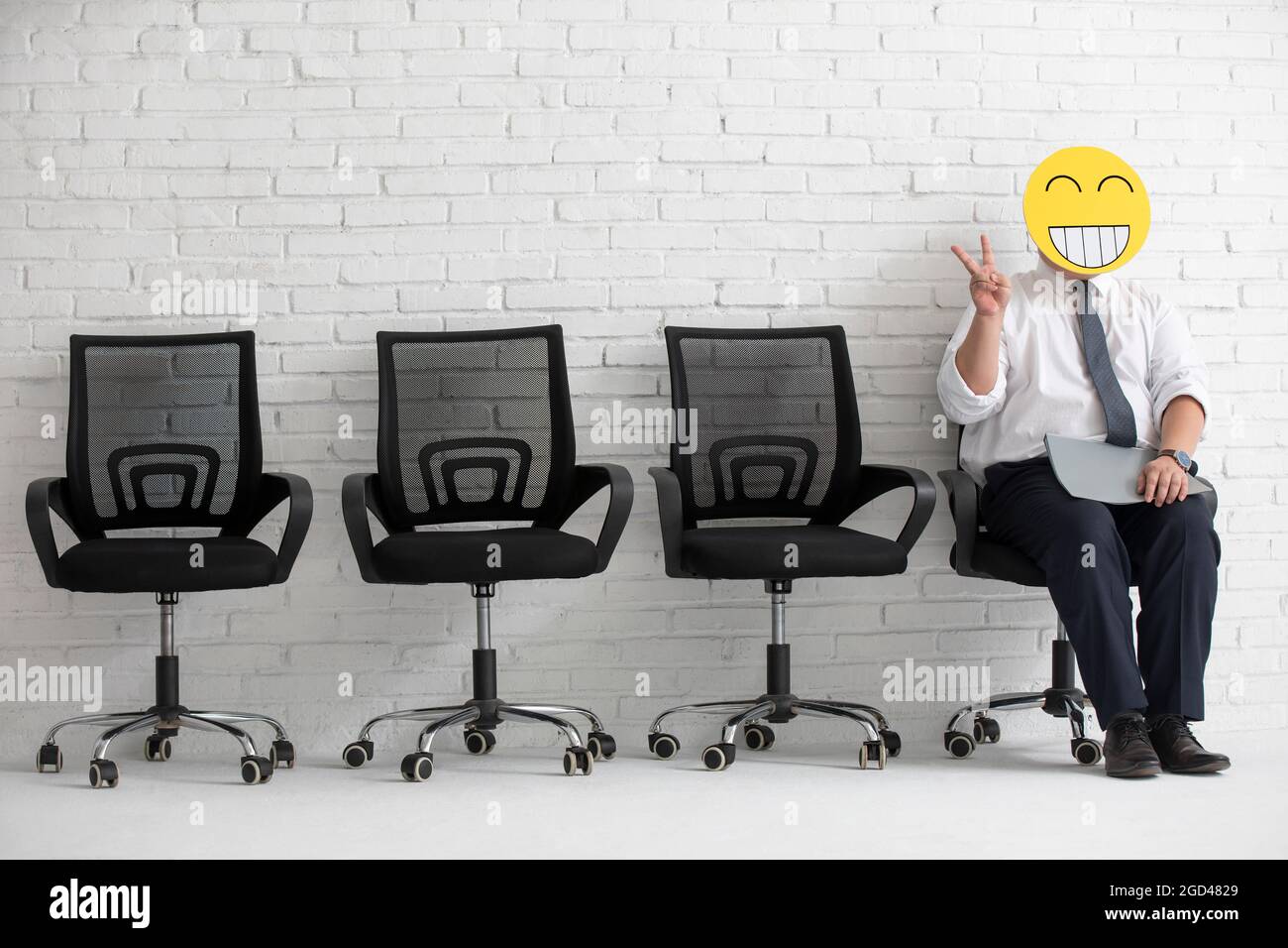 Businessman smiley face sign hi-res stock photography and images - Alamy