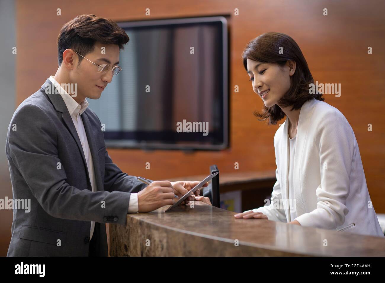 Front desk counter chinese hi-res stock photography and images - Alamy