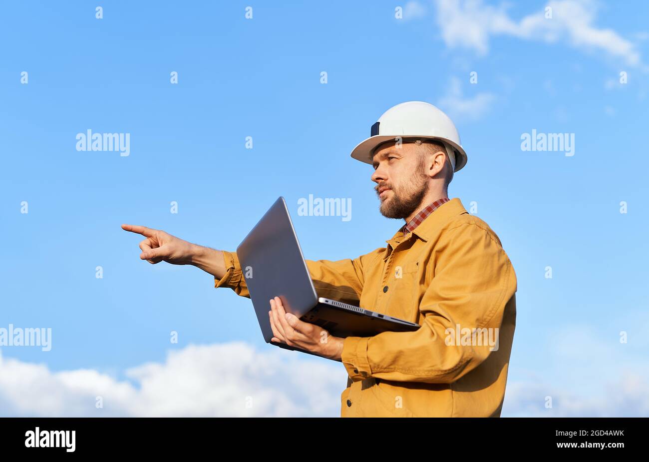 Cute bearded caucasian supervisor, architect, technician or building ...
