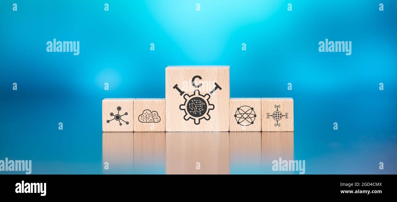 Wooden blocks with symbol of ict concept on blue background Stock Photo ...