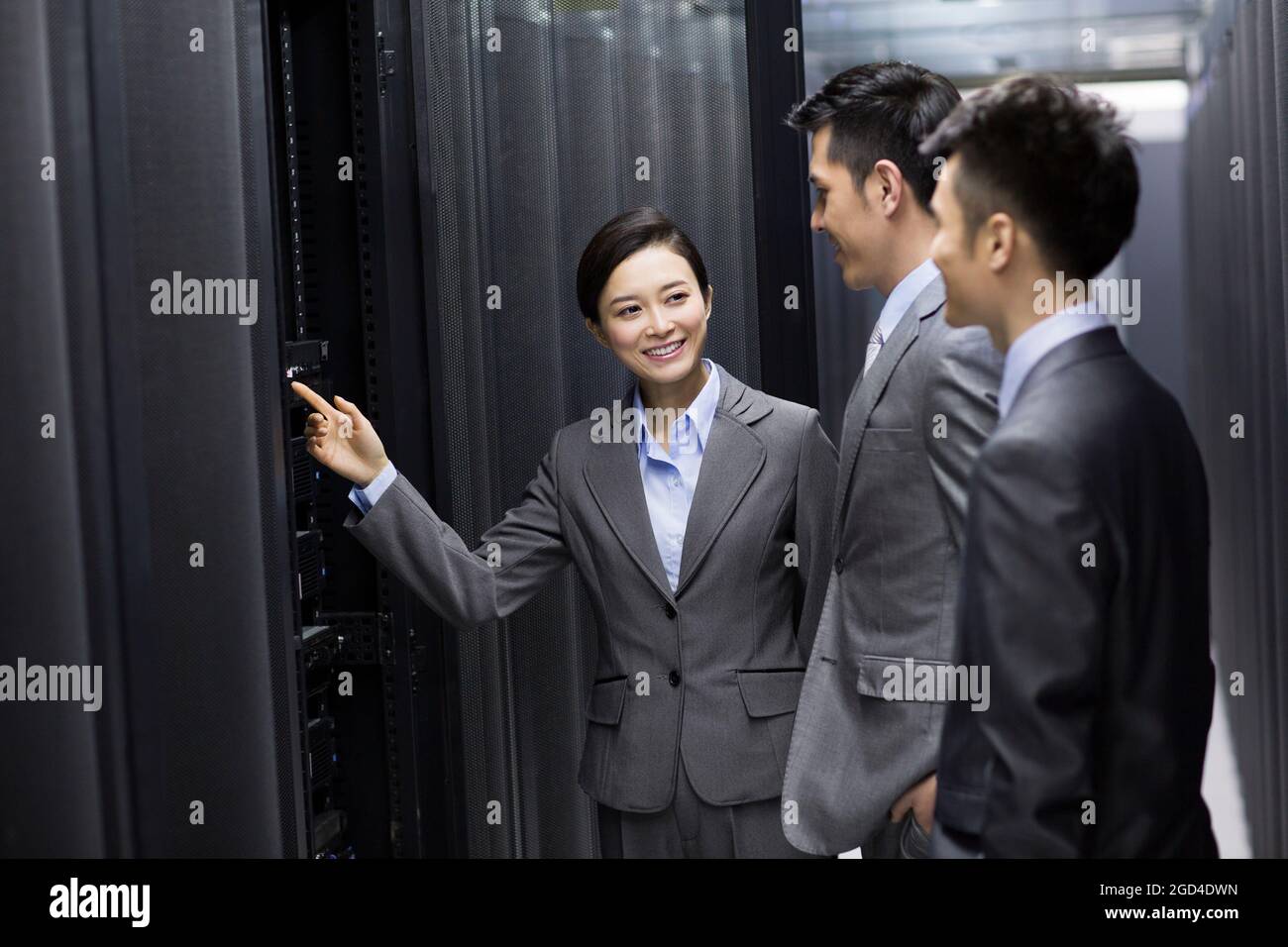 Business team visiting computer room Stock Photo - Alamy