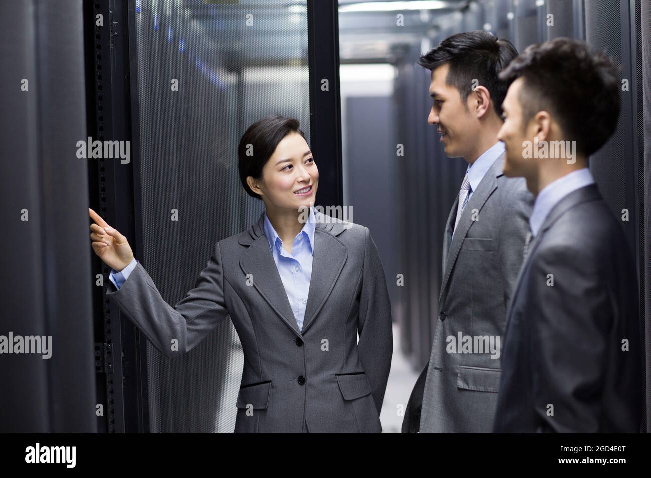 Business team visiting computer room Stock Photo - Alamy