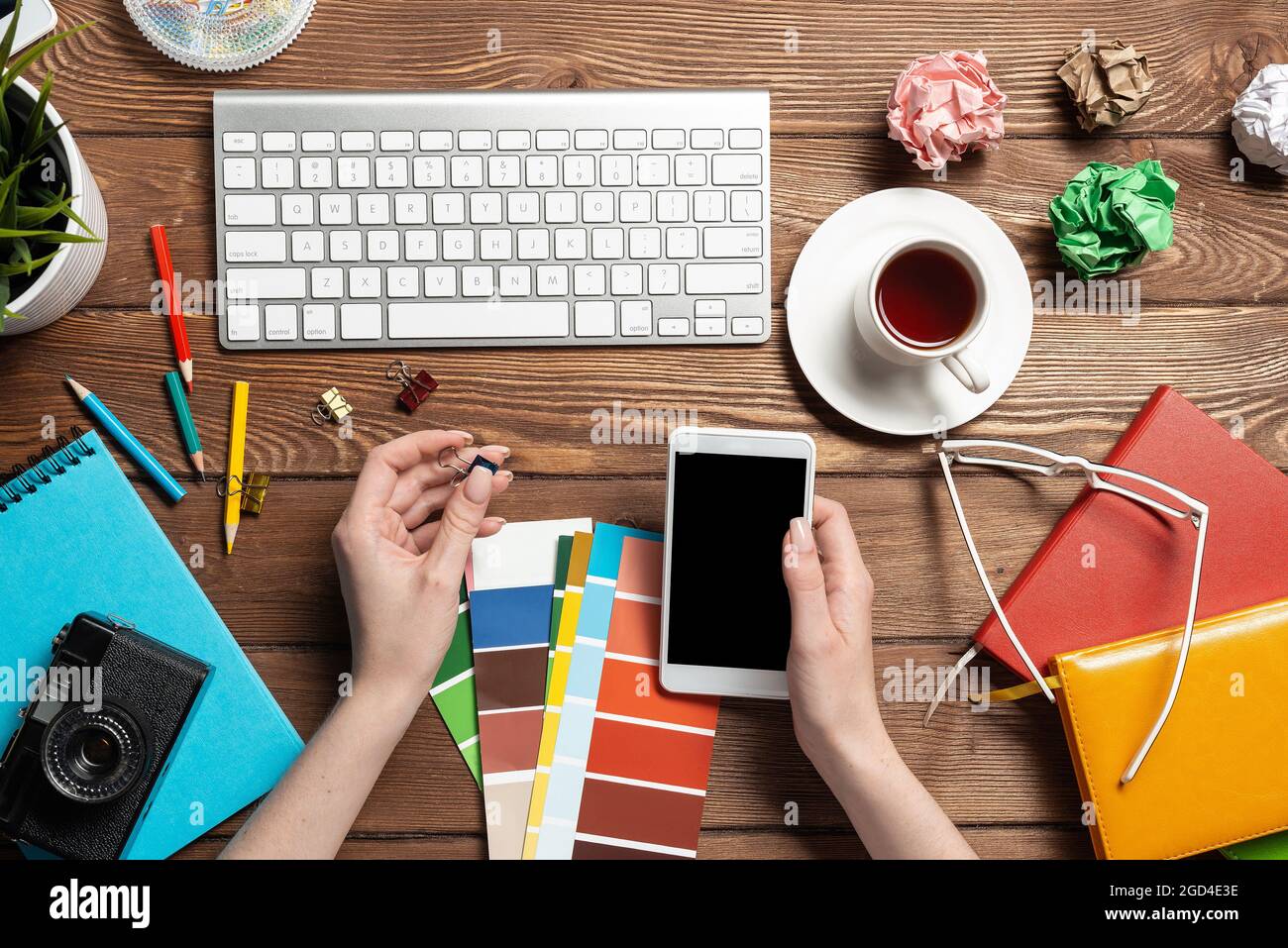Web designer choosing colors from swatches Stock Photo - Alamy