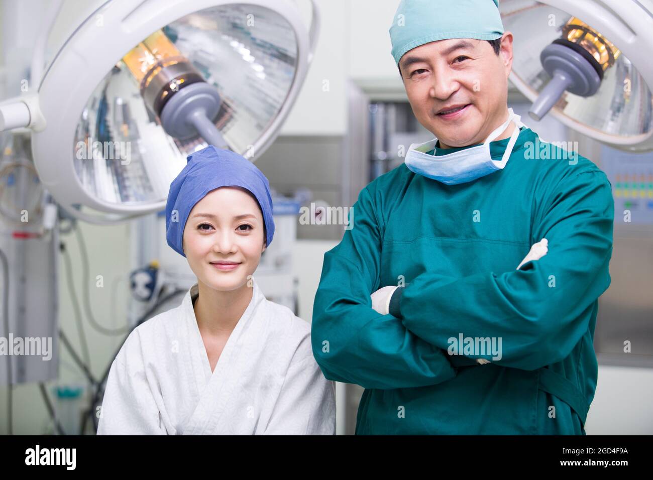 Patient with doctor after a successful plastic surgery Stock Photo - Alamy