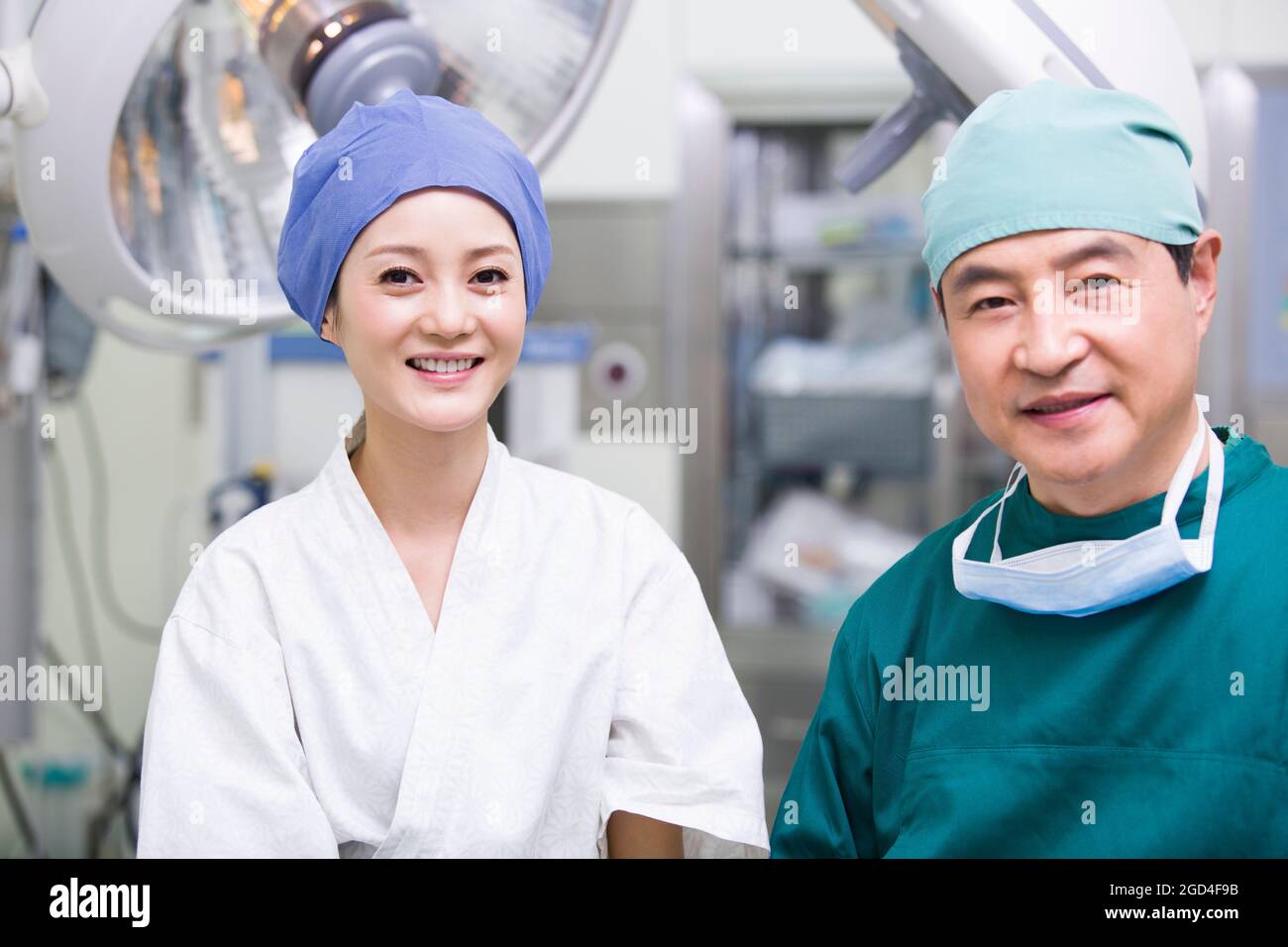 Patient and doctor smiling after a successful plastic surgery Stock ...