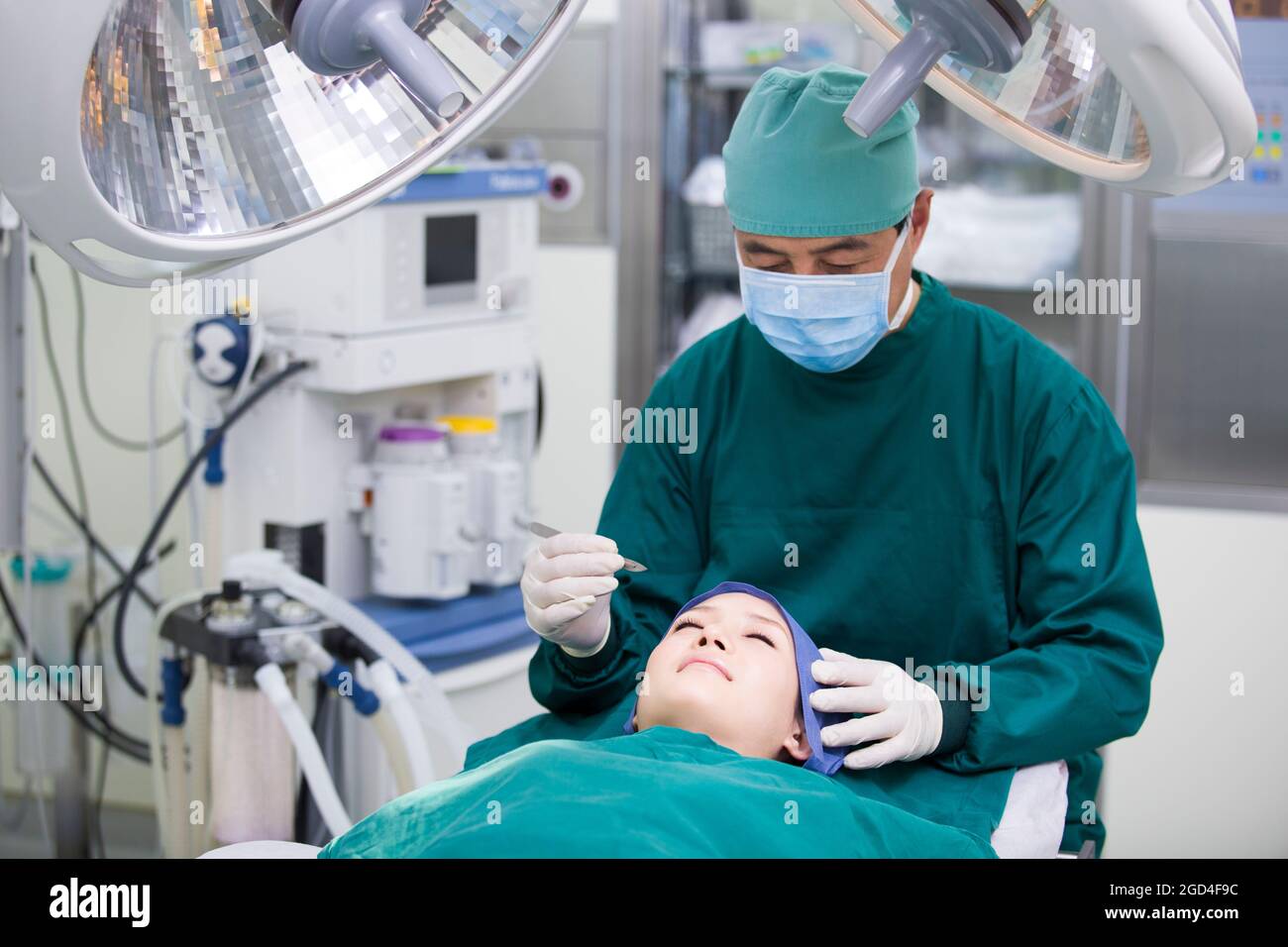 Patient on operating table receiving plastic surgery Stock Photo - Alamy