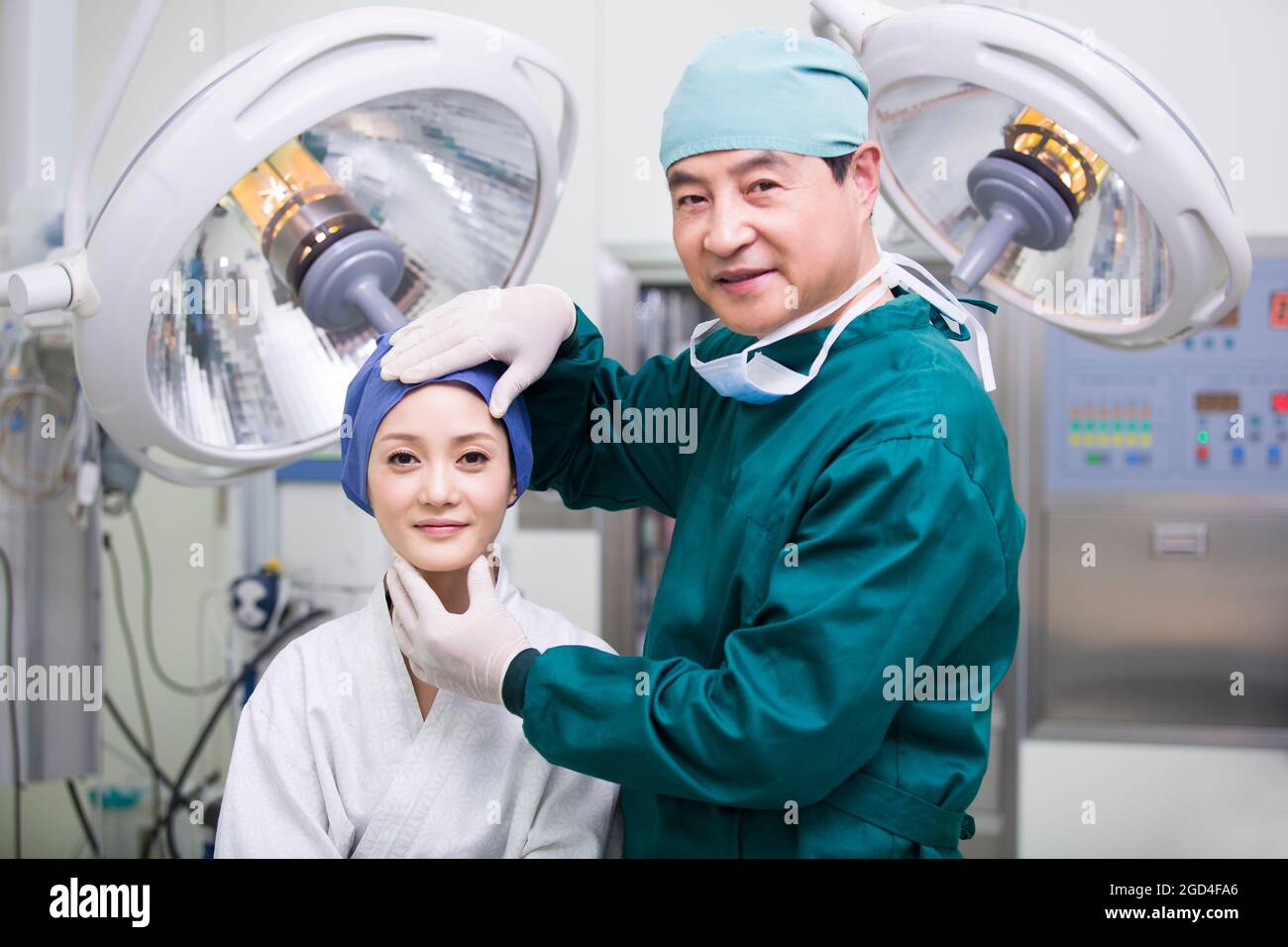 Patient and doctor smiling after a successful plastic surgery Stock ...