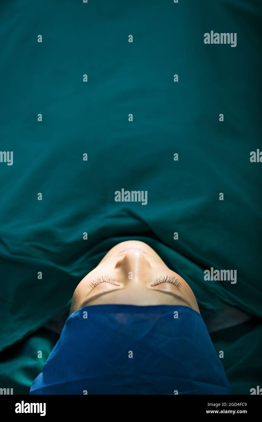 Patient on operating table ready to receive surgery Stock Photo - Alamy