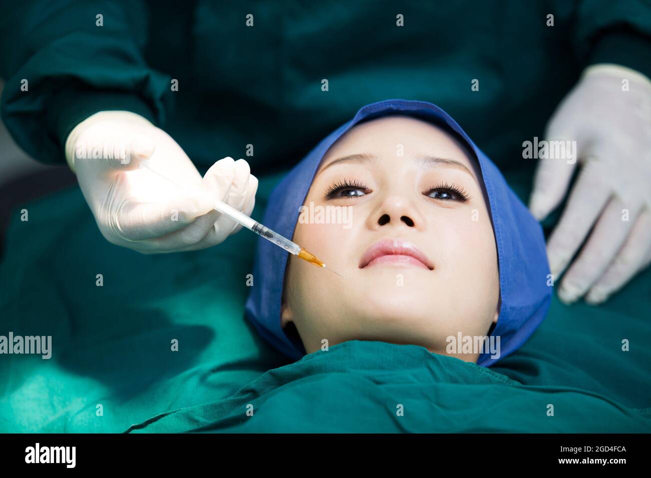 Patient on operating table receiving plastic surgery Stock Photo - Alamy