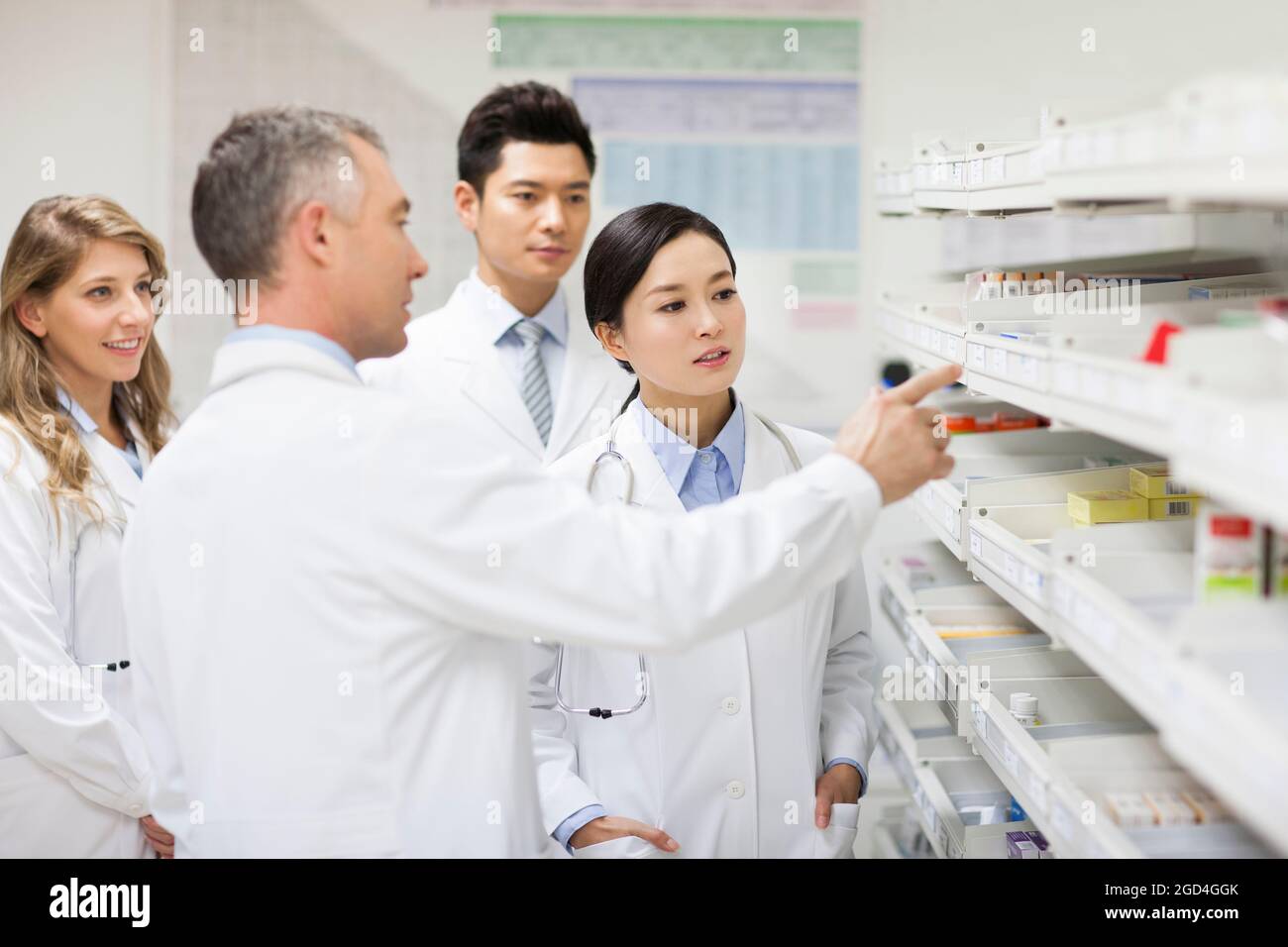Pharmacists in pharmacy of hospital Stock Photo - Alamy