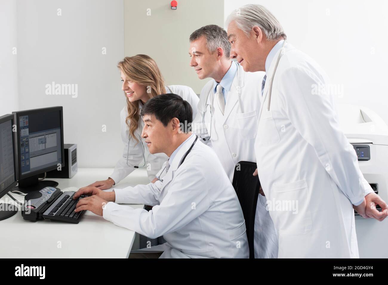Doctors at work Stock Photo - Alamy