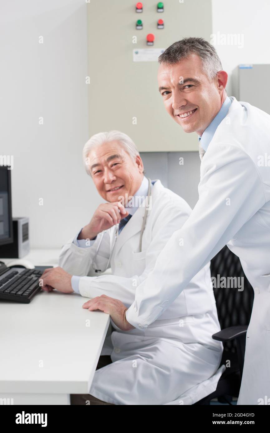 Doctors at work Stock Photo - Alamy