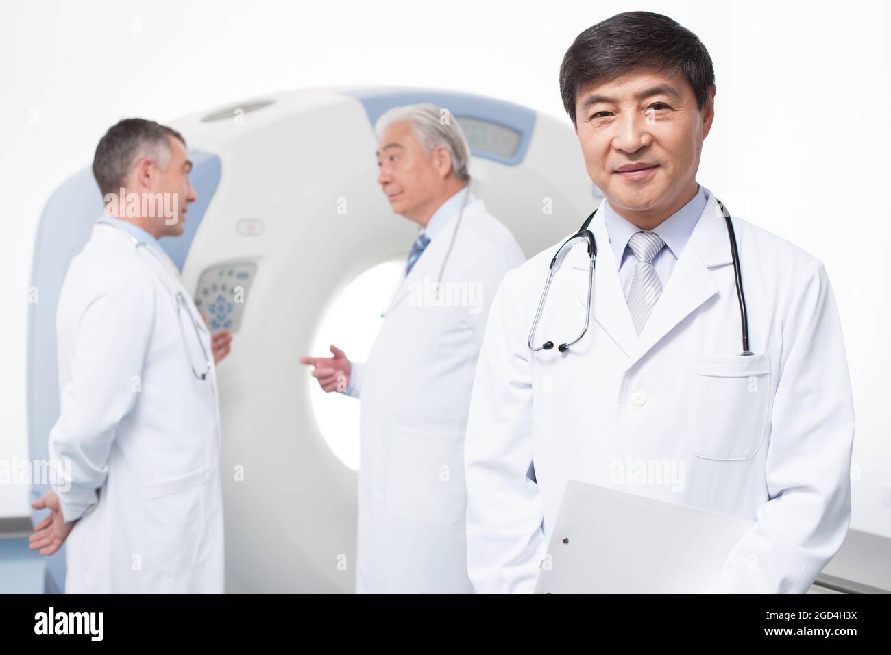 Doctors in CT room Stock Photo - Alamy