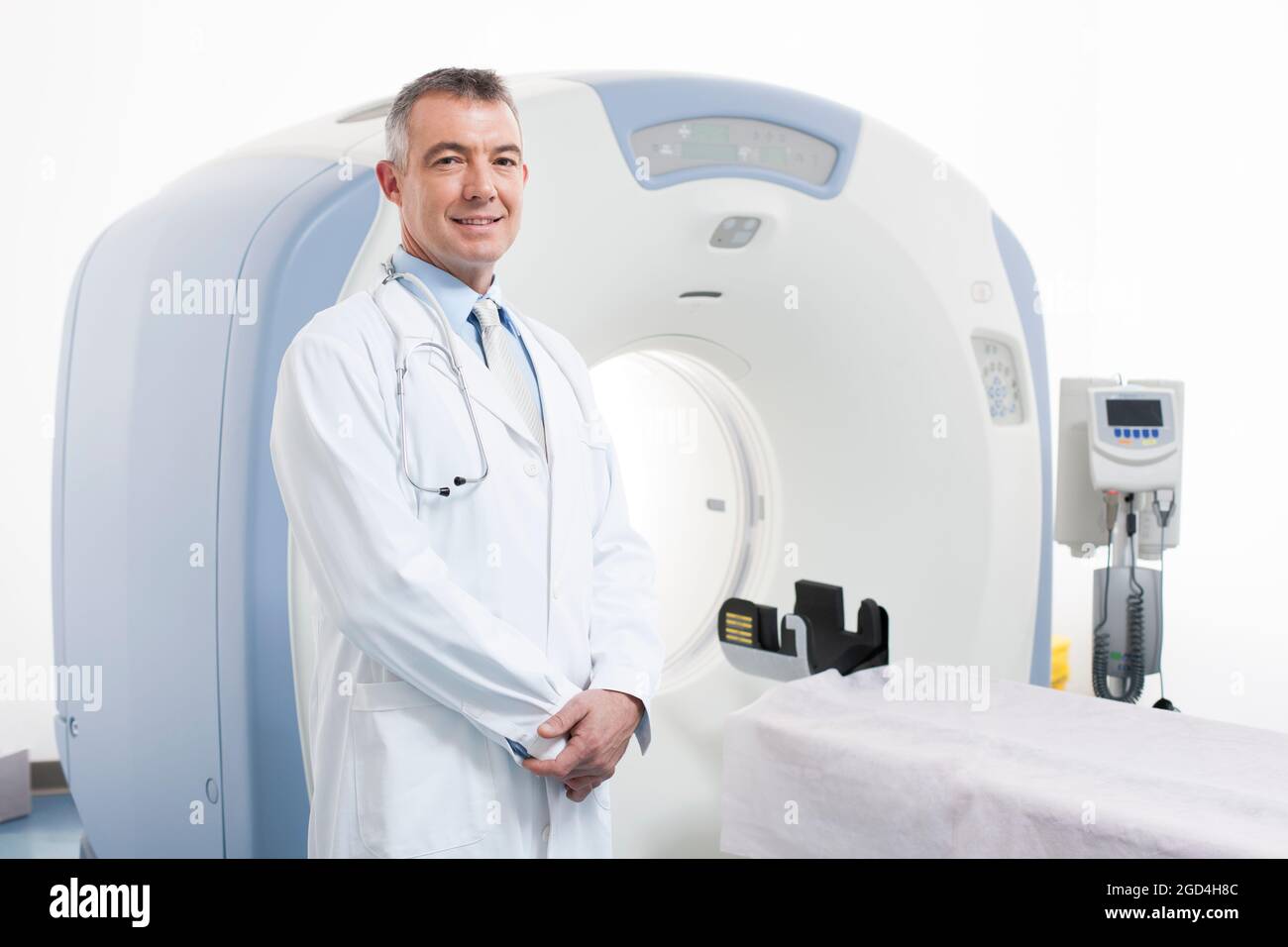 Doctor with MRI scanner Stock Photo - Alamy