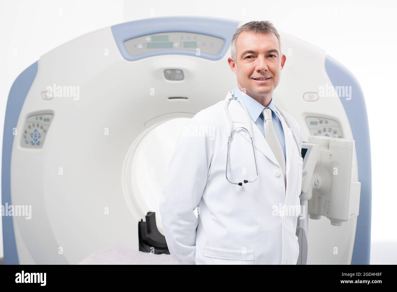 Doctor with MRI scanner Stock Photo - Alamy