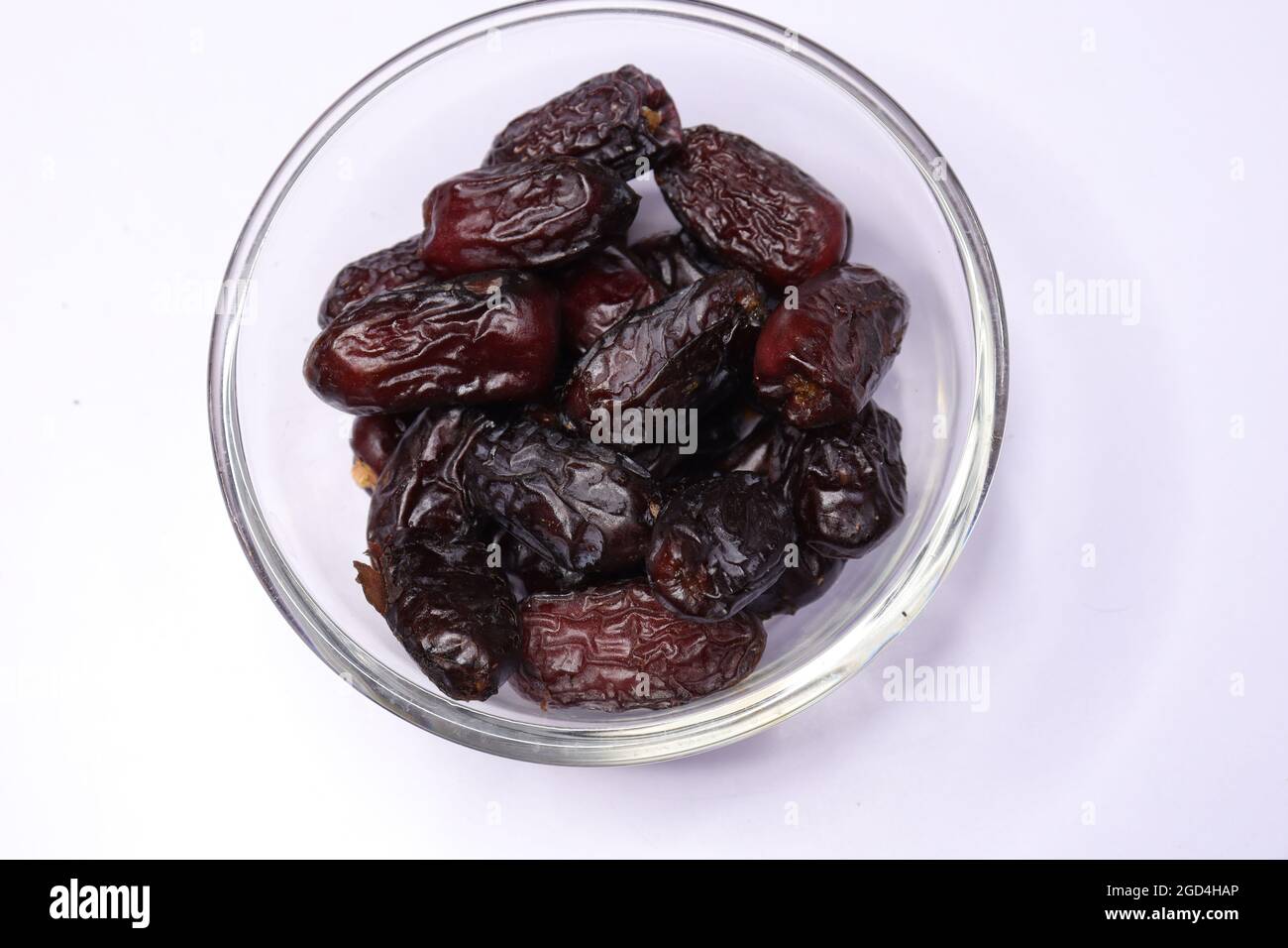 Raw Organic Dates fruit isolated on a white background Stock Photo - Alamy