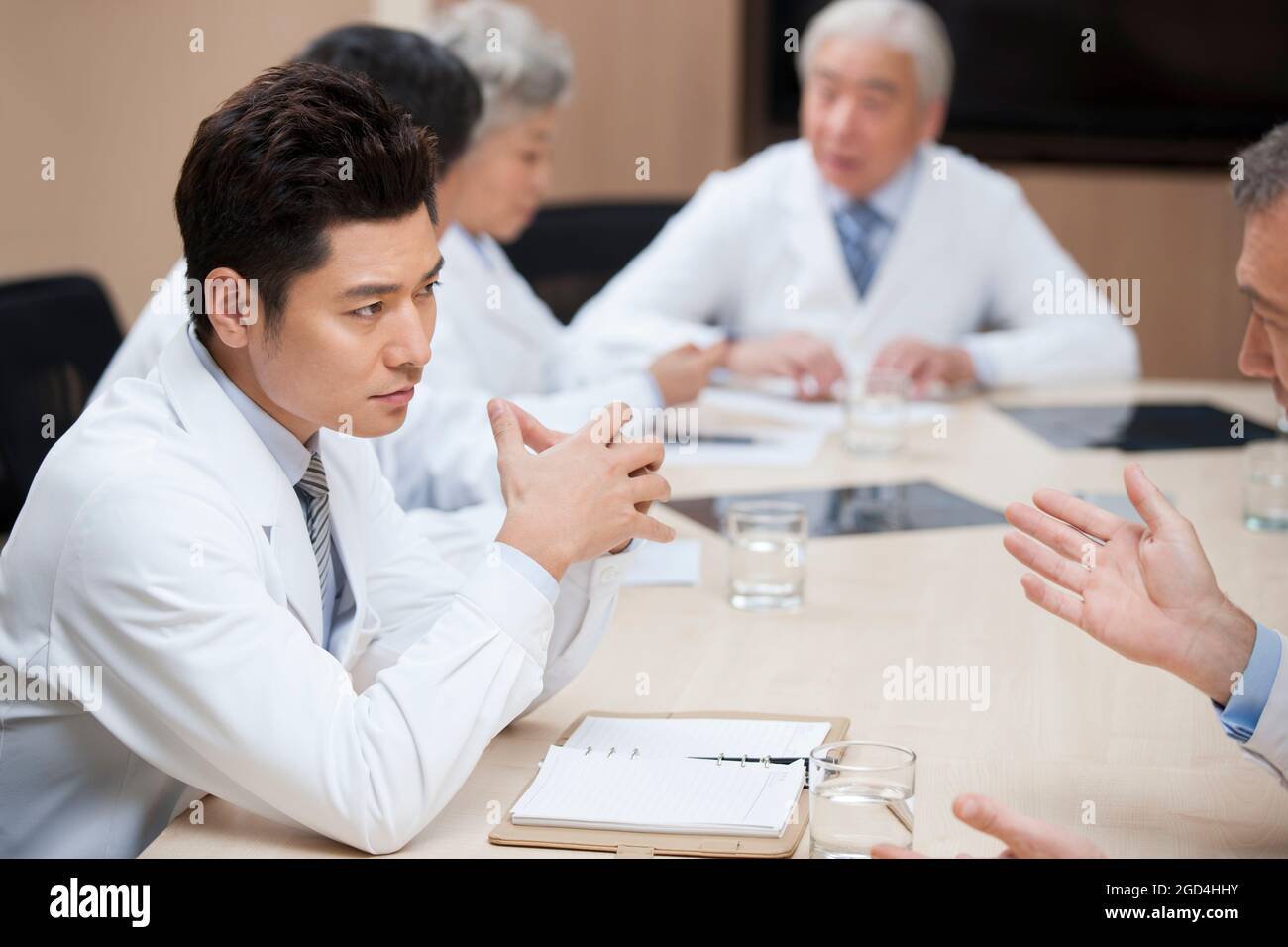 Medical experts holding a meeting Stock Photo - Alamy